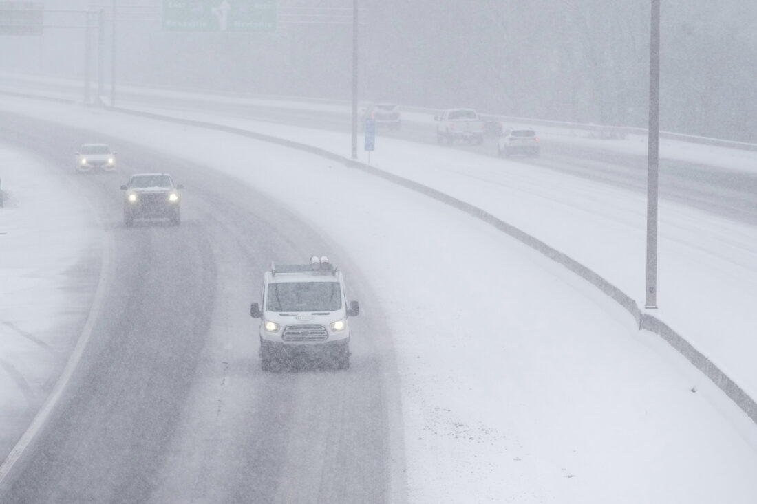 Powerful winter storm dumps heavy snow, causing flight delays, slick ...